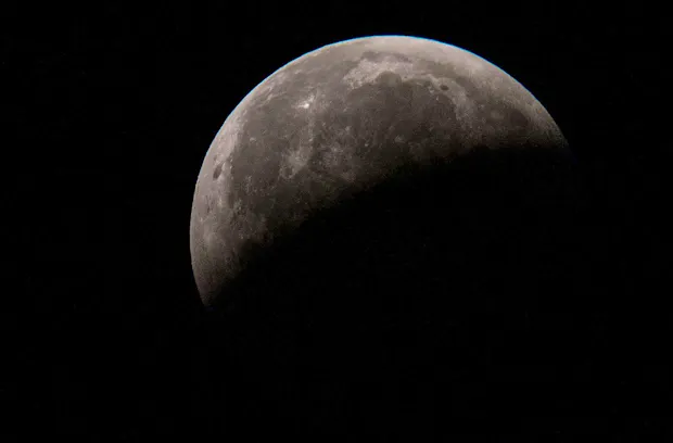 Partial lunar eclipse on September 18: How to see the "nibbled" moon ...