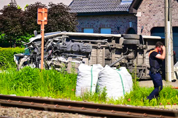 Police release new details: Belgium Buggenhout: School bus hit by train ...