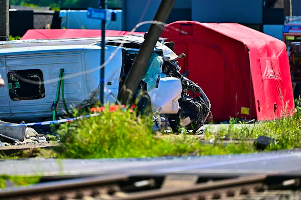 Police release new details: Belgium Buggenhout: School bus hit by train ...
