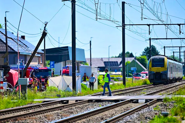 Police release new details: Belgium Buggenhout: School bus hit by train ...